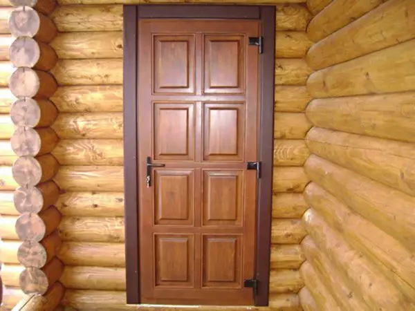 Wooden entrance door in a private house