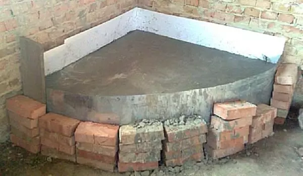 Hardened foundation for corner furnace-fireplace