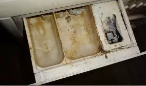 خاک در سینی ماشین لباسشویی