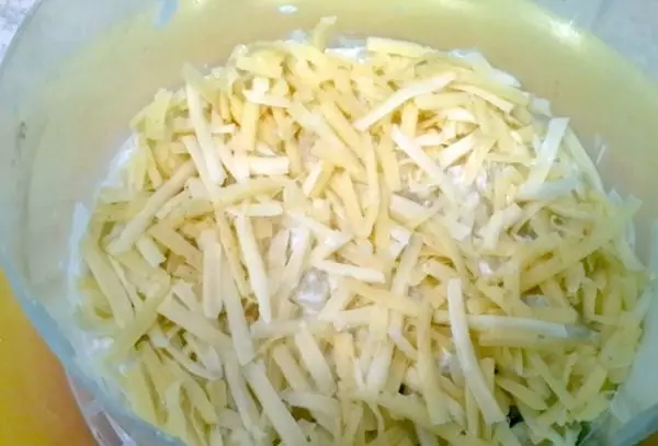 Solid grater solid ost i en plast molding ring