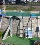 Piscina de marc amb estiratge i sistema de filtració