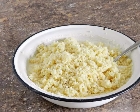 Millet in a bowl with cottage cheese