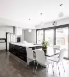 Large kitchen with white walls in the house