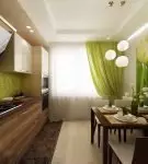 Green curtains and decor on the wall of the kitchen