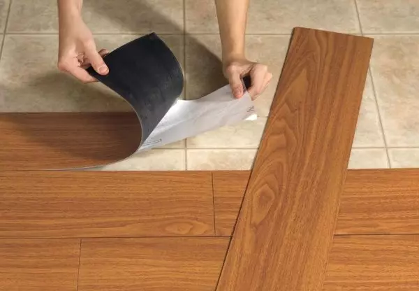 Self-adhesive laminate.