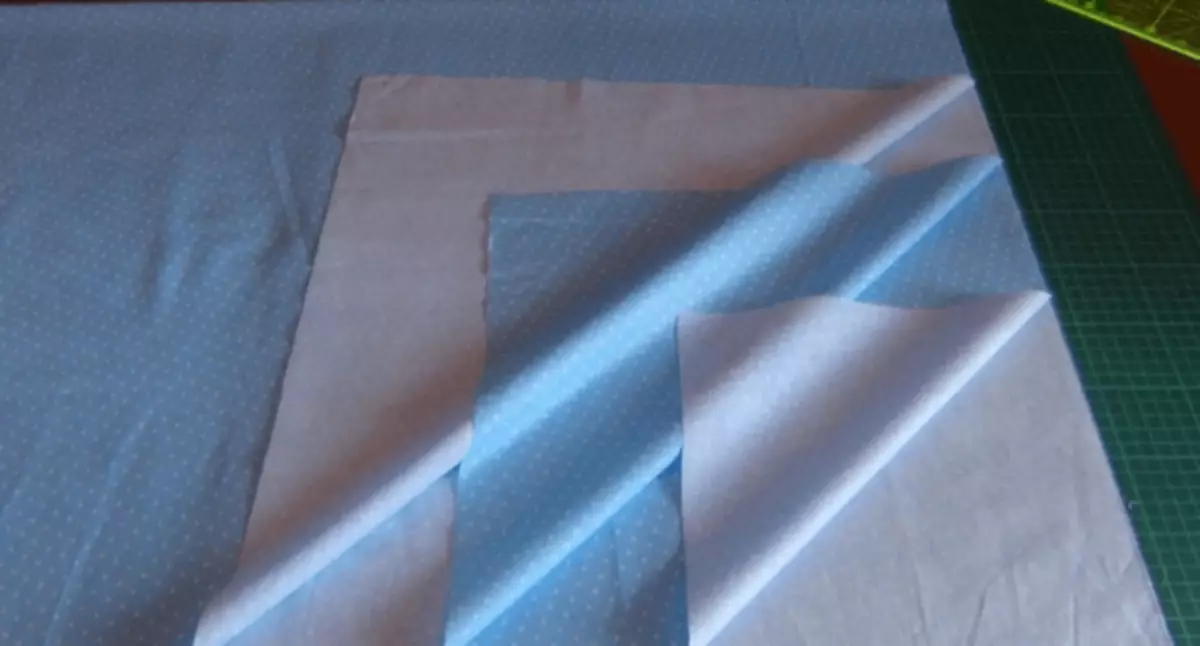 Properly folded piece of fabric for sewing sheets on a rubber band