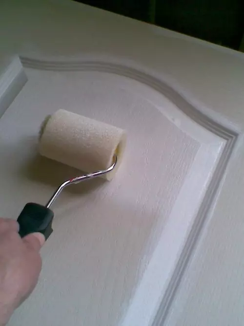 Skilder wit deur