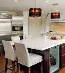 White chairs and countertop in the kitchen