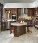 Oval island in a large kitchen