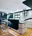 Contrast ceiling decoration in the kitchen with an island