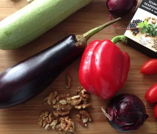 Products for cooking vegetables on a Georgian mangale on the table