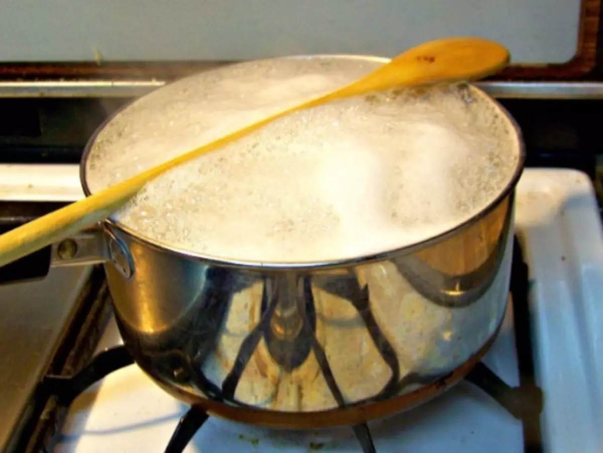 Milk boils in a saucepan