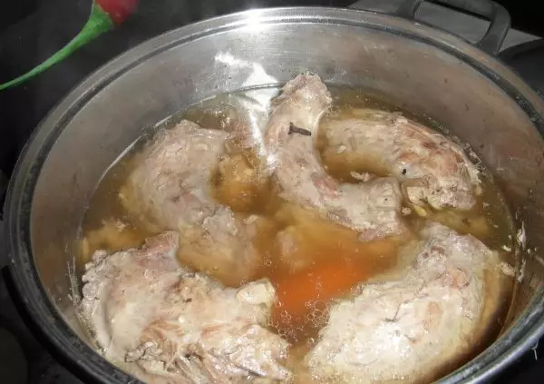 Pieces of turkey in a saucepan