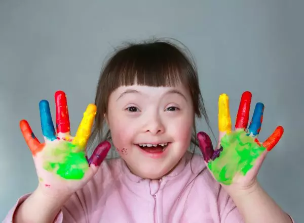 Dítě s Downovým syndromem
