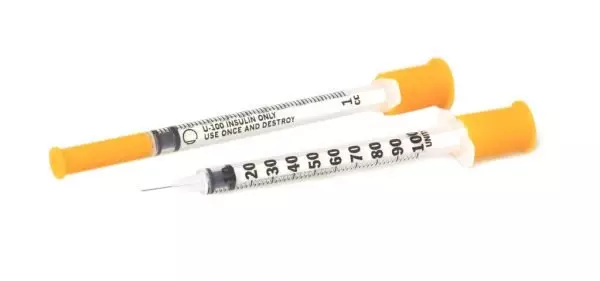 Insulin syringe.