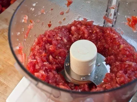 Peppers and tomatoes crushed in a blender
