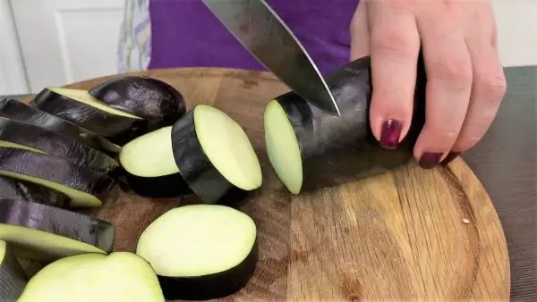 Cutting eggplants.