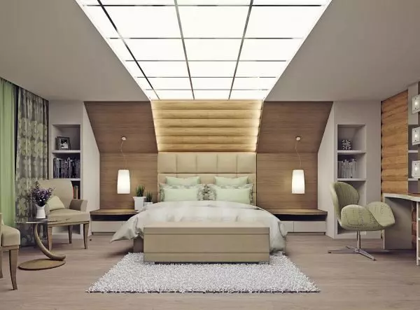 Schlafzimmerdesign mit großem Bett in Mansard