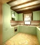 Lysegrønne møbler i køkkenet i stil med Provence