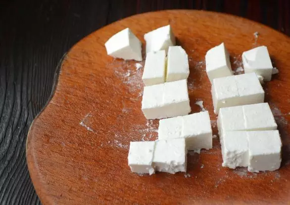 Txiav Cubes Feta Cheese On Txiav Board
